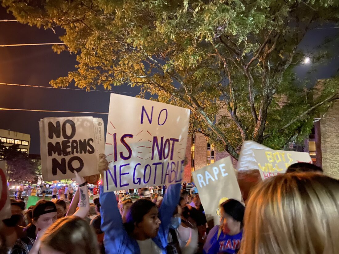 Hundreds protest outside KU fraternity in response to alleged sexual ...